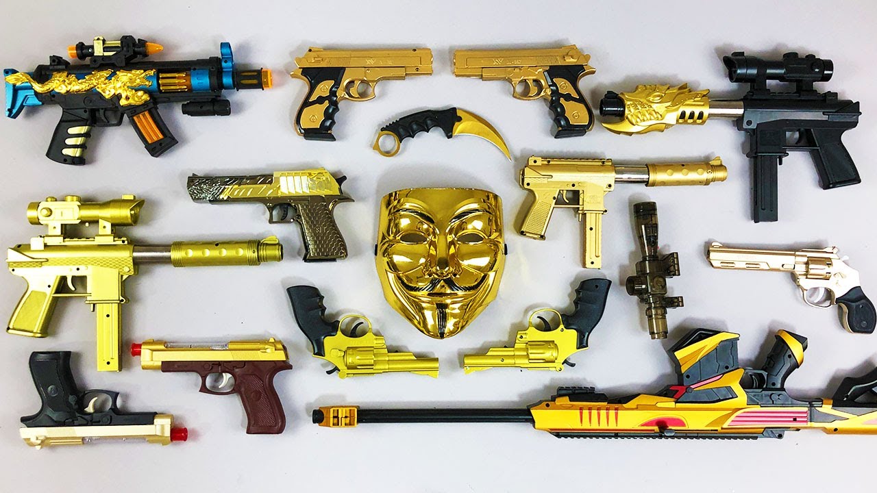 GOLD GUNS - FULL OF WEAPONS ON THE TABLE - YouTube