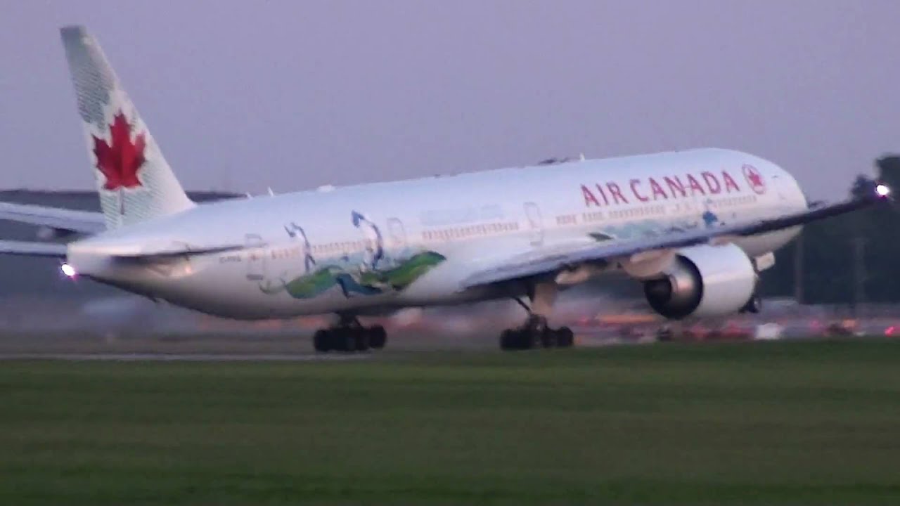 AC 77W C-FIVS departing YUL on 24R in HD - YouTube