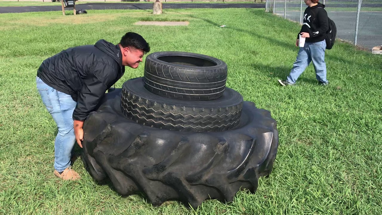 Flipping A Tractor Wheel YouTube flipping-a-tractor-wheel-youtube