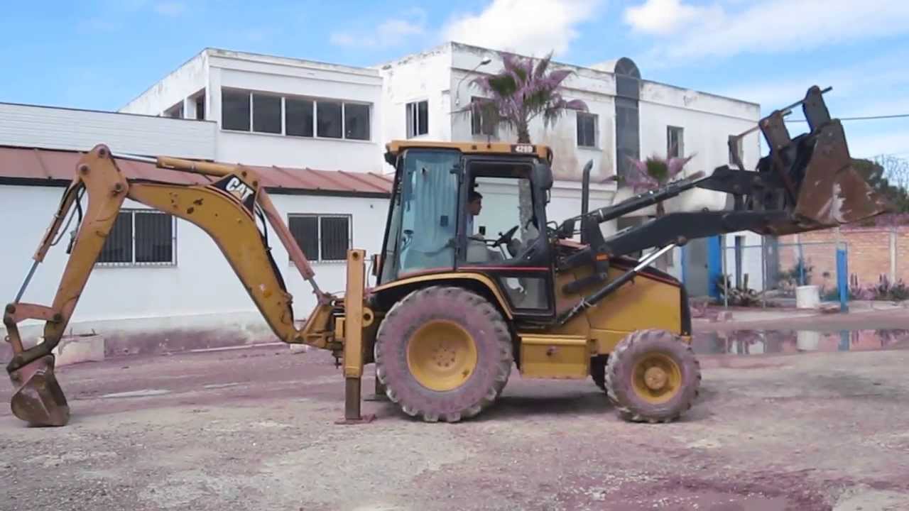 CATERPILLAR 428D, YEAR 2003 - YouTube