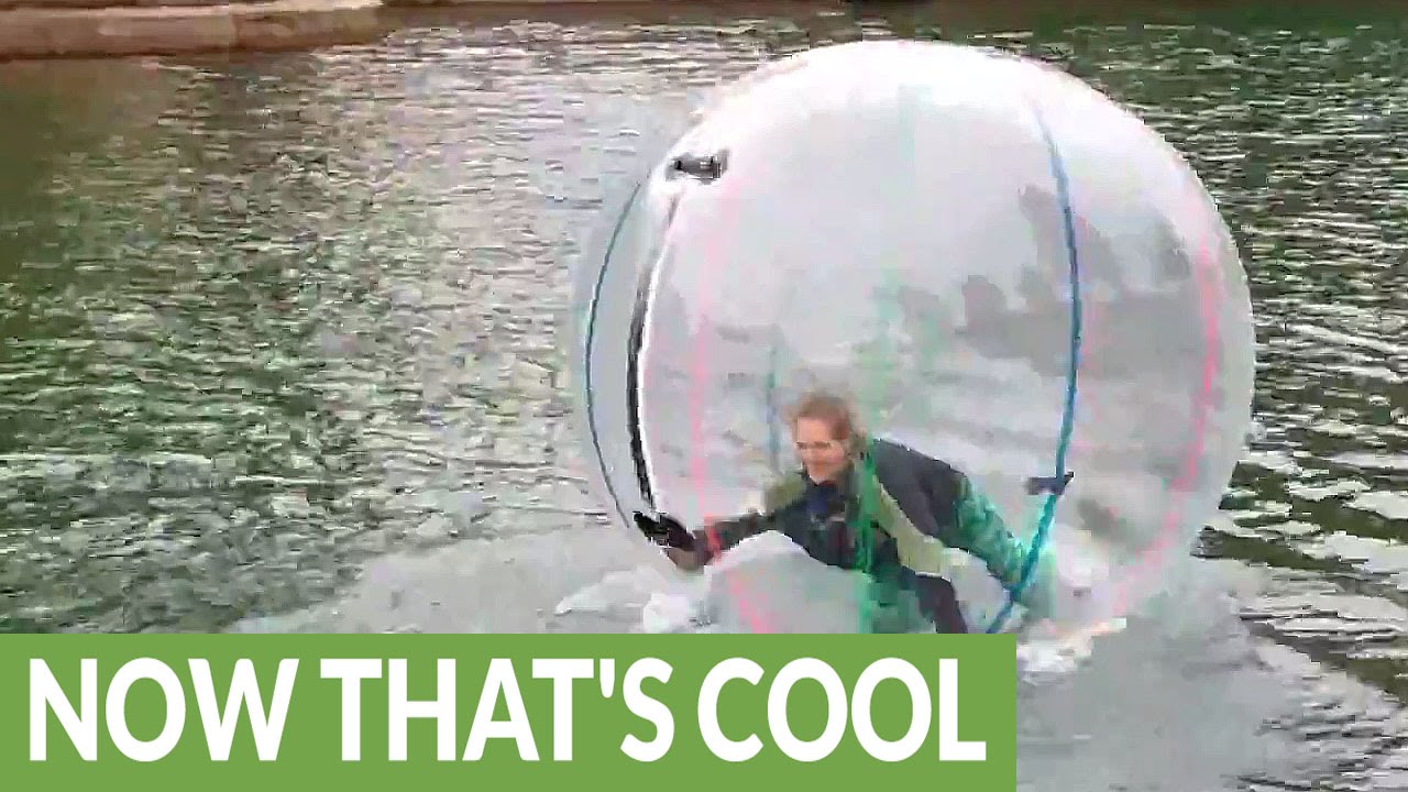 Giant aqua bubble allows for rolling on water - YouTube