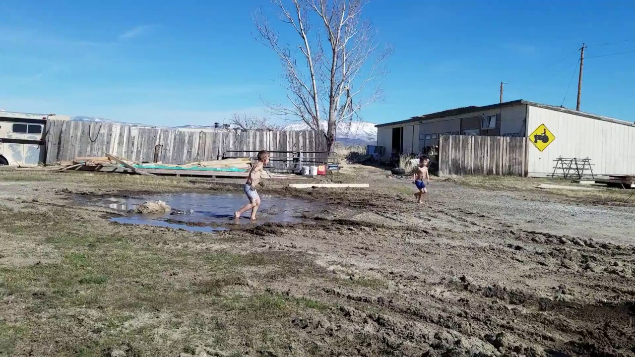 Kids and giant mud puddles! - YouTube