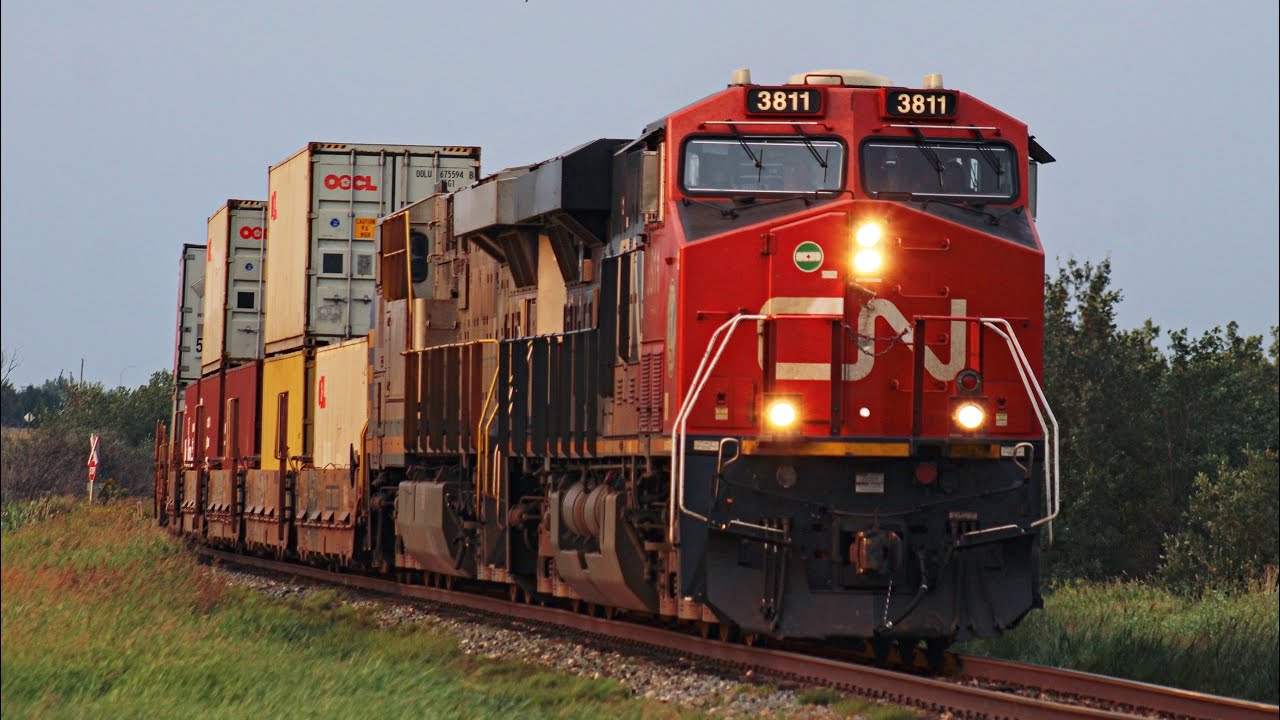 CN 3811 leads CN Z115 Southbound stack train near New Norway, AB on the ...