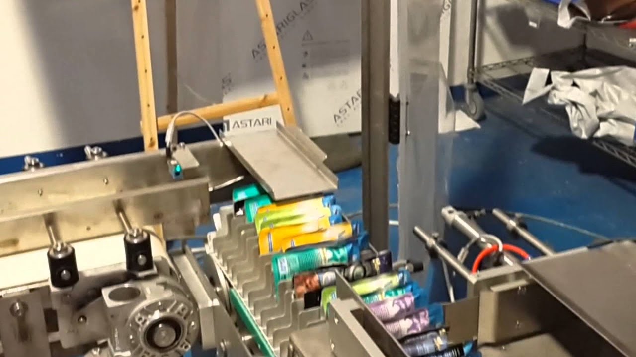 repack sachet feeding machine - YouTube