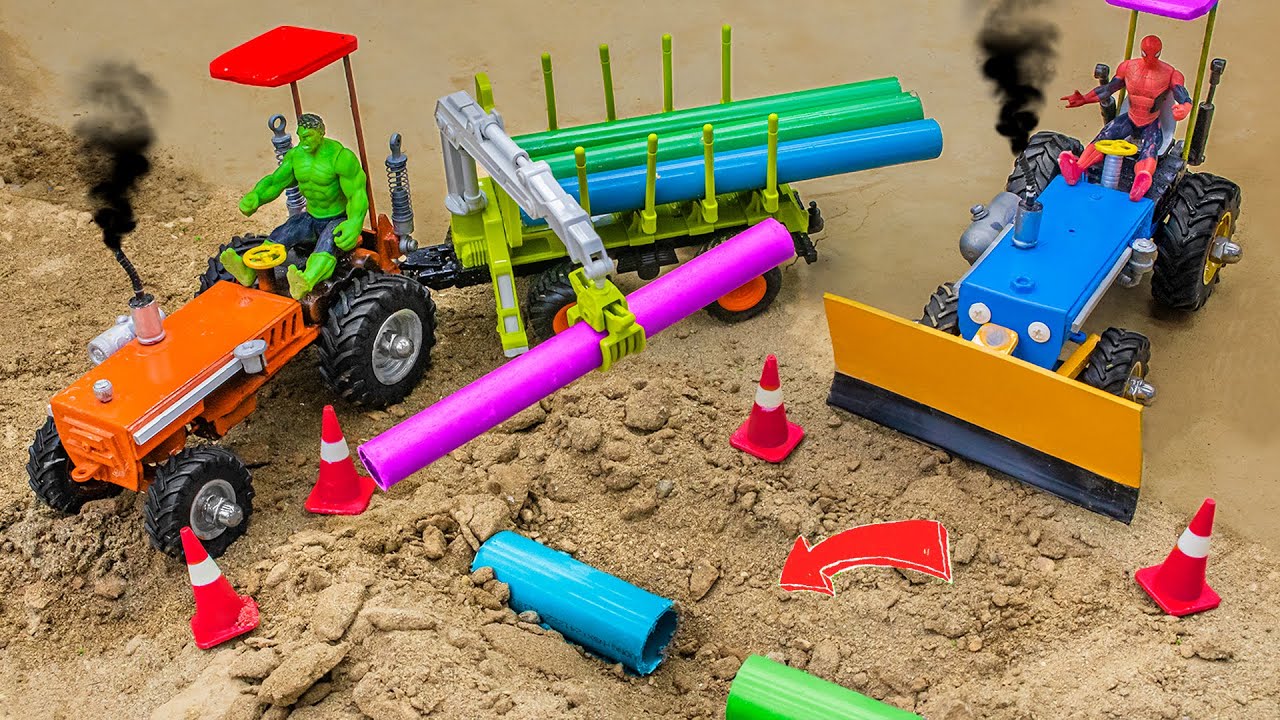 DIY tractor making mini bulldozer to road repair with many round pipes ...