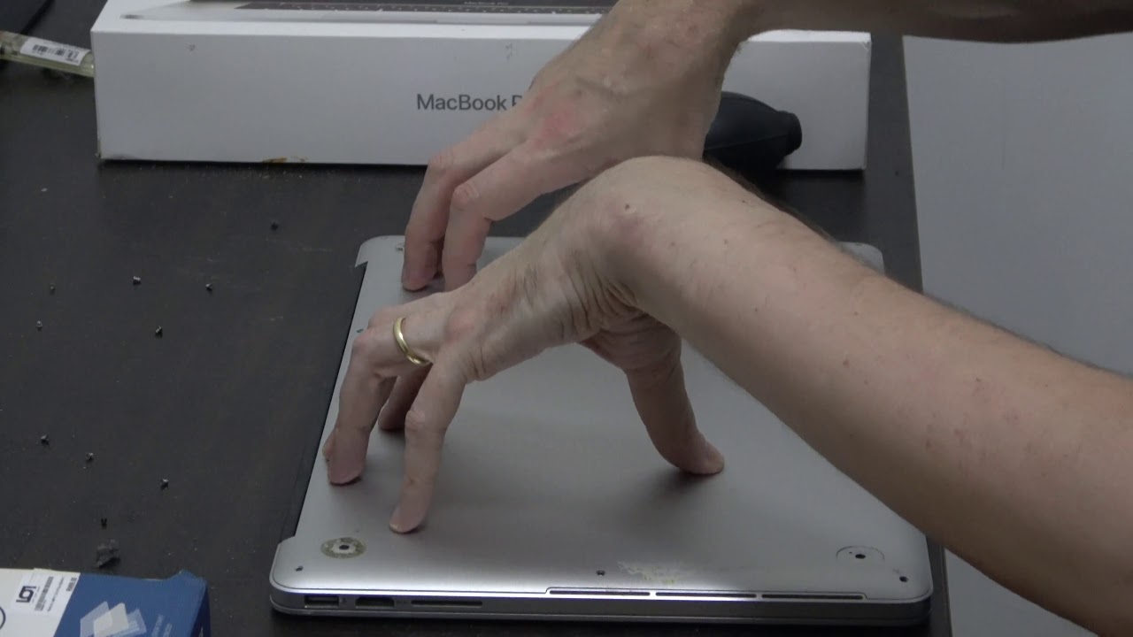 Cleaning the build up of dust in a 2014 MacBook Pro. - YouTube