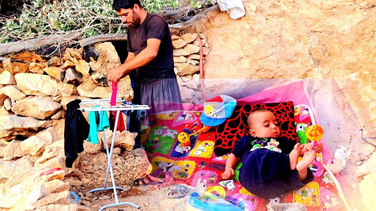 Feeding Baby Formula and Washing the Baby's Clothes by the Alone ...