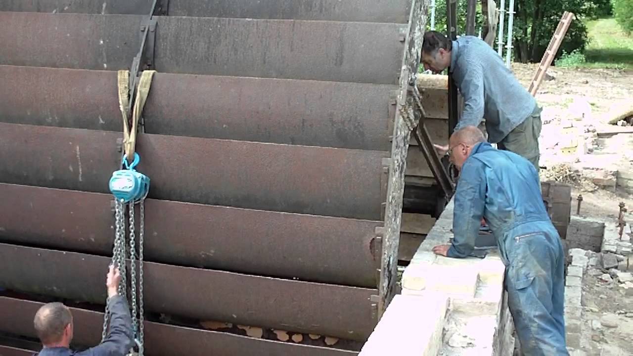 Narborough Bone Mill water wheel turns for the first time - YouTube