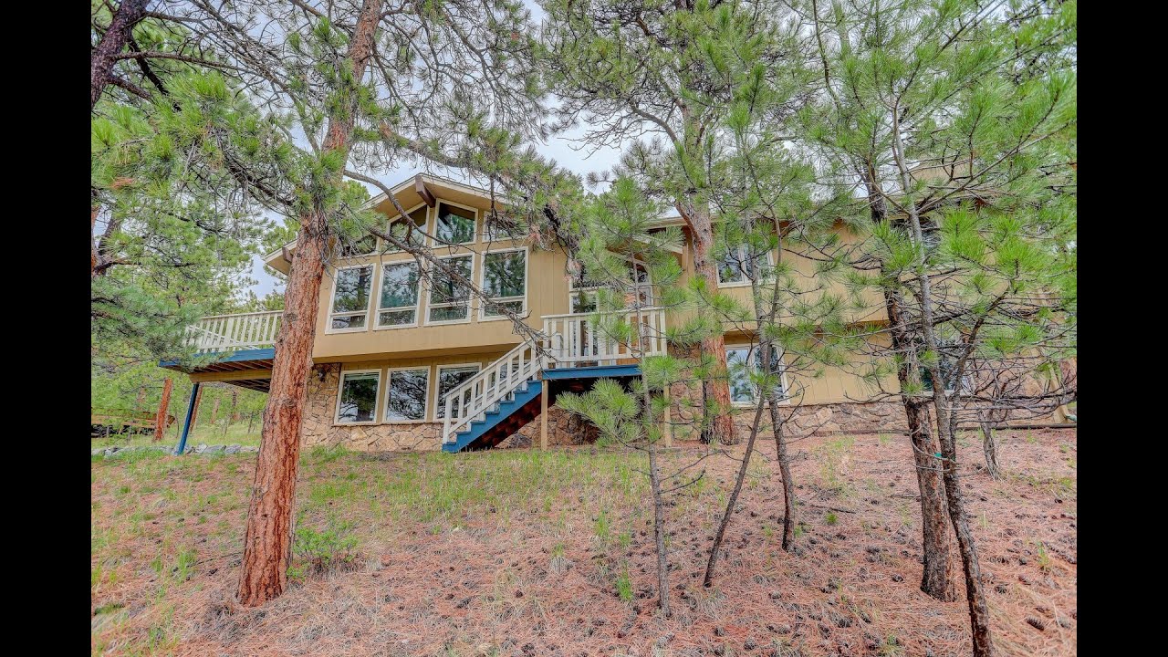 Bethany Chamberlain presents 30677 Lewis Ridge Road Evergreen, CO ...