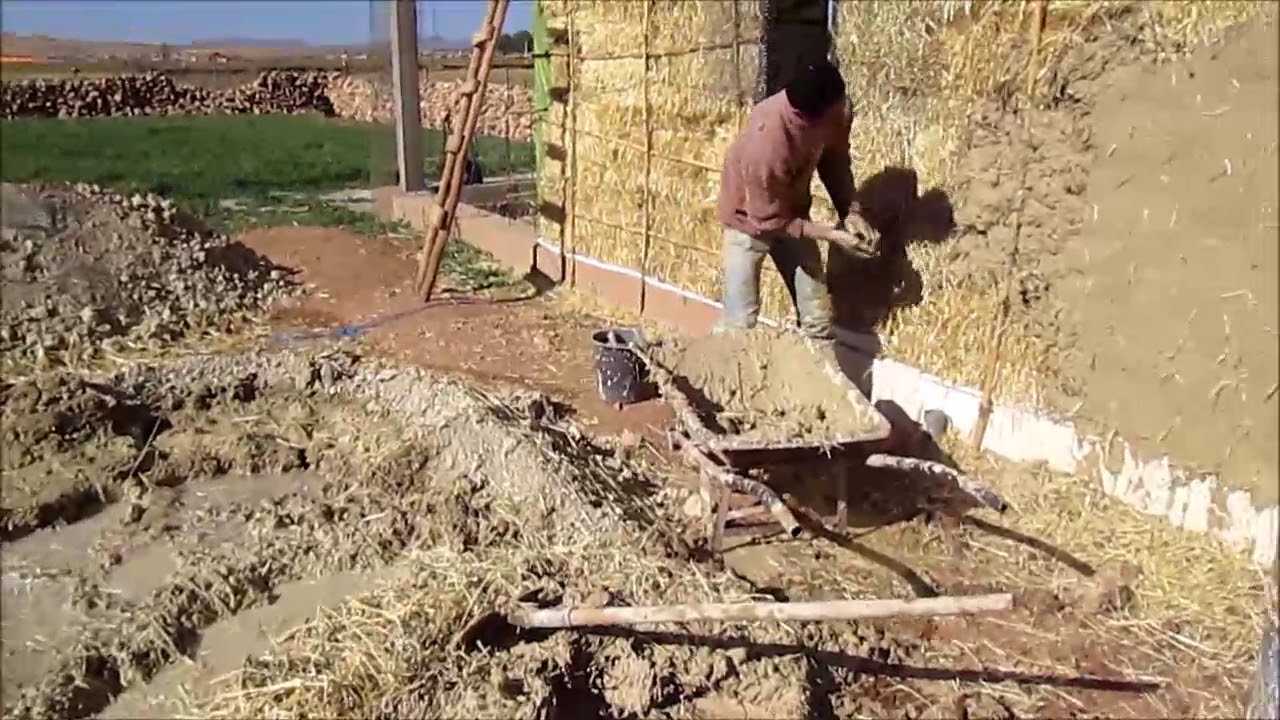 stucco on straw bale wall - YouTube