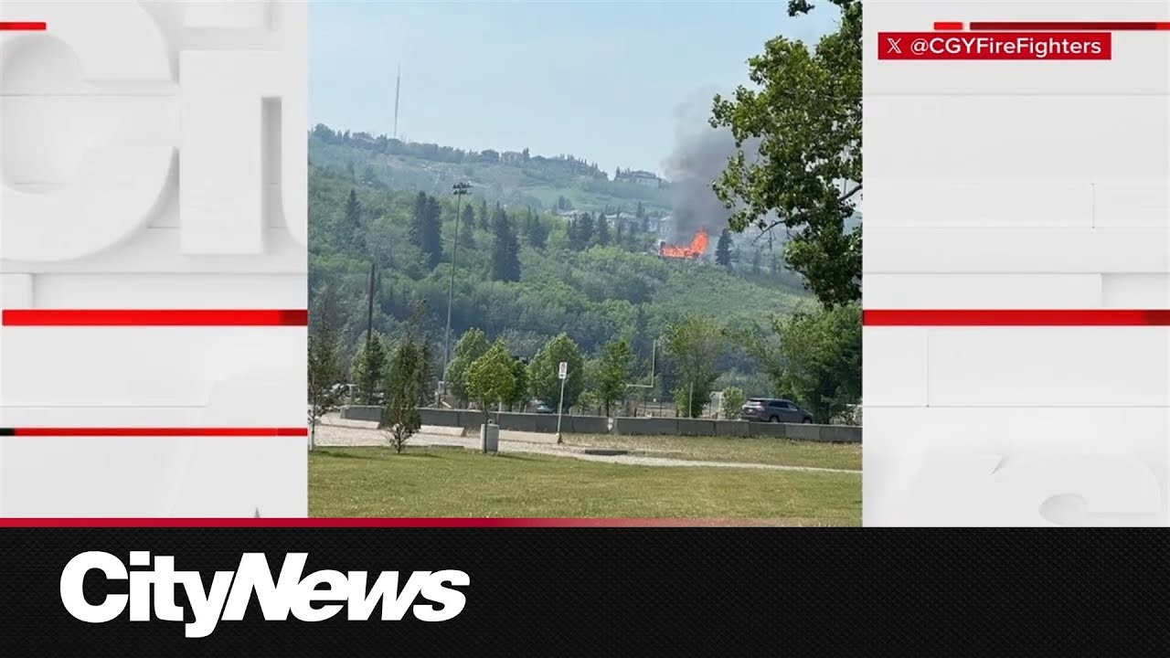 No hydrants, high heat: Calgary fire crews battle NW house blaze - YouTube