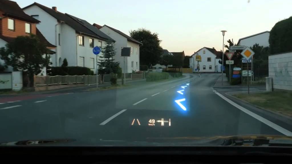 Continental's prototype 2017 AR-Head Up Display showing the turn-by ...