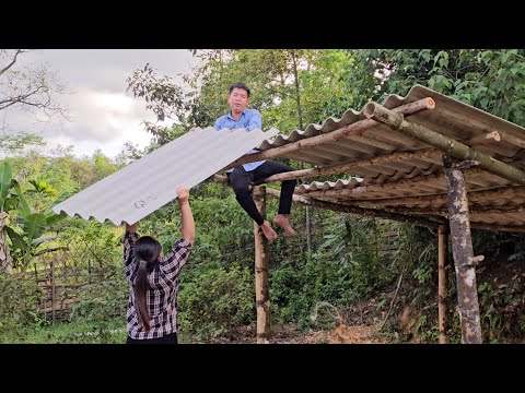 The homeless girl and Mr. Khang quickly finished the roof of the pigsty before it rained.