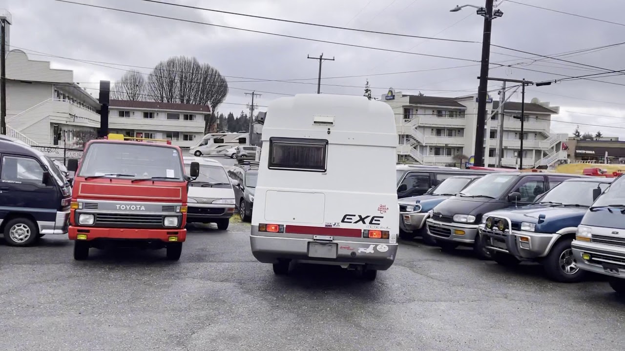 SOLD Nissan Atlas EXE diesel 4wd camper - YouTube