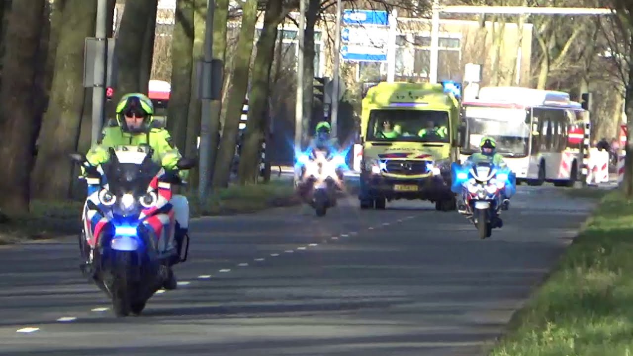 Emergency escort! Dutch police escort an ambulance from a hospital to ...