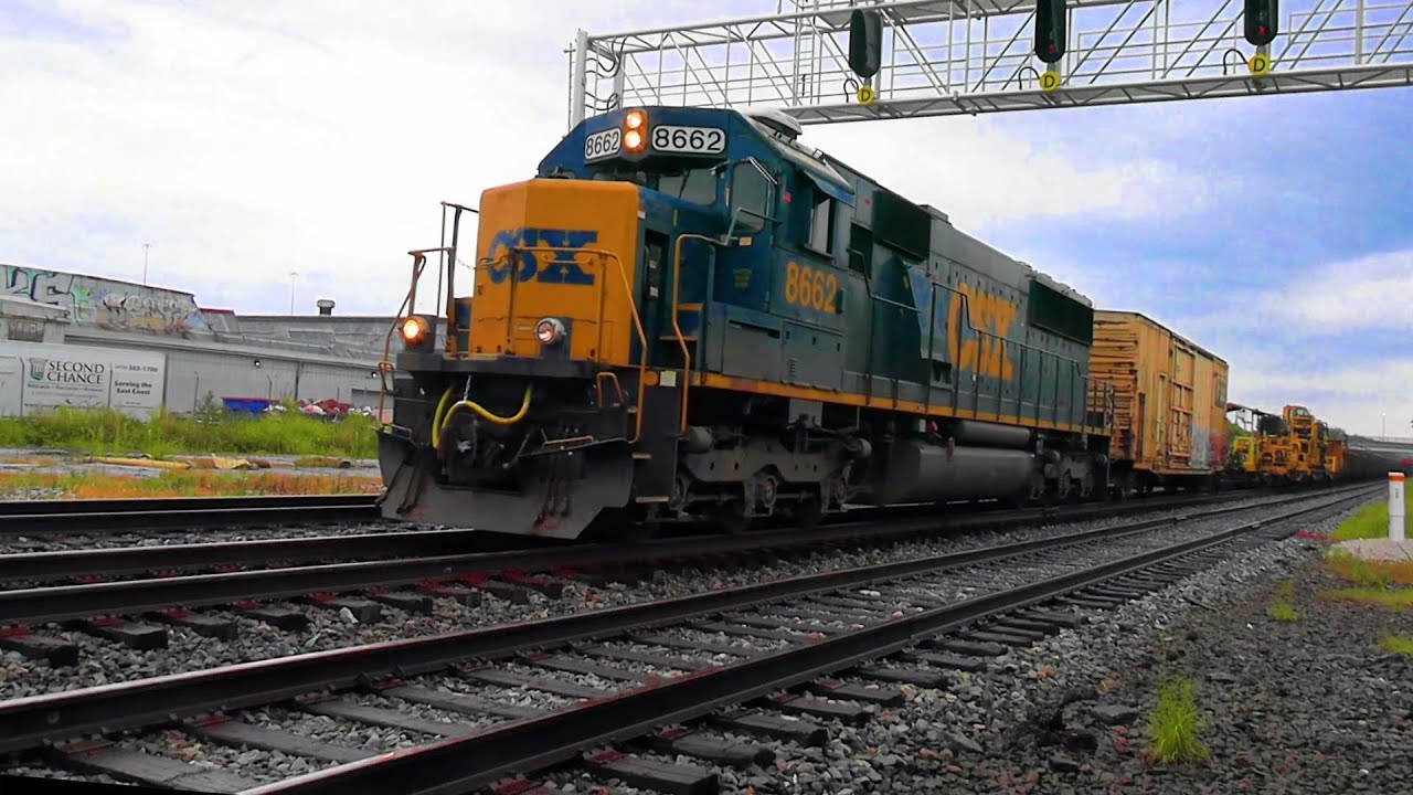 8/17/24 CSX SD50-3 leads MOW W010 a loaded rail train at Bush St ...