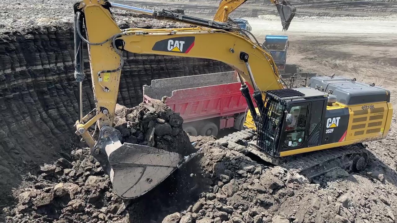 Caterpillar 352F Excavator Loading Mercedes & MAN Trucks - Ascon Ltd ...