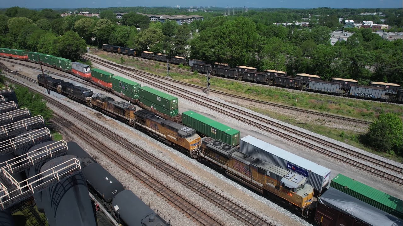 An NS Stack Races a Freight with Three UP Units into Inman Yard, Two ...