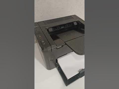 HP 1606dn - YouTube