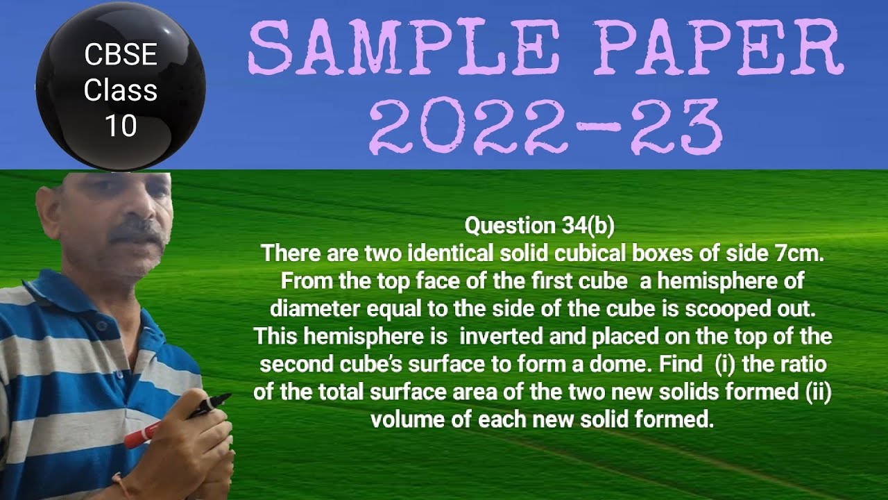 There are two identical solid cubical boxes of side 7cm. From the top ...