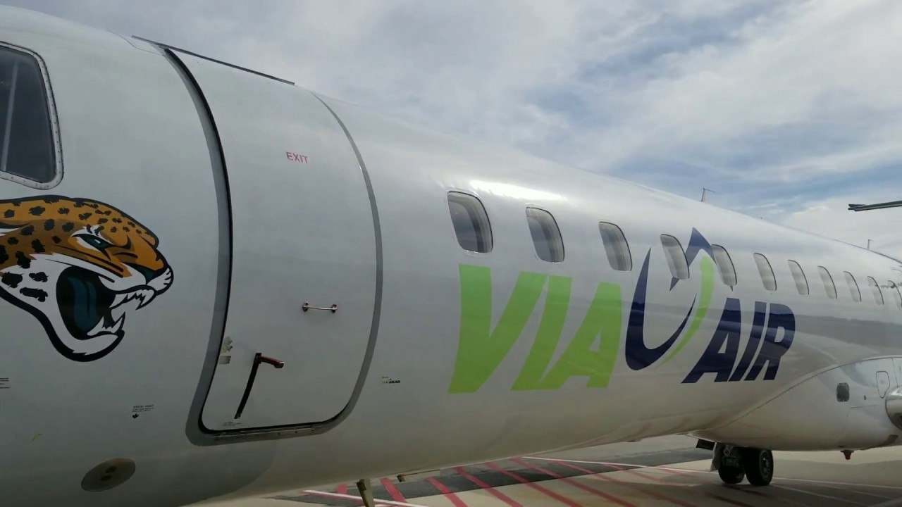 All aboard Via Airlines Jacksonville Jaguars flight... - YouTube
