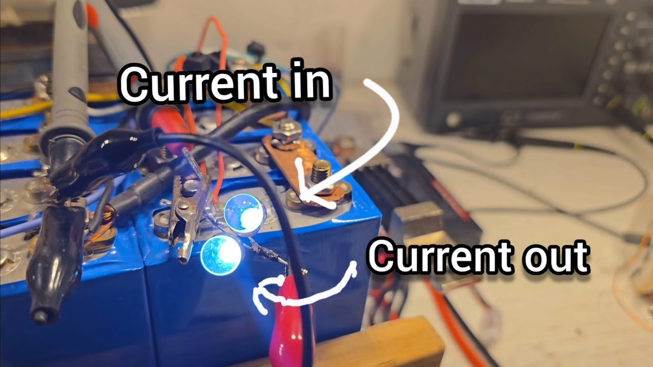 Two 10 millimeter LEDS lit with 5 milliamps of current in series with ...