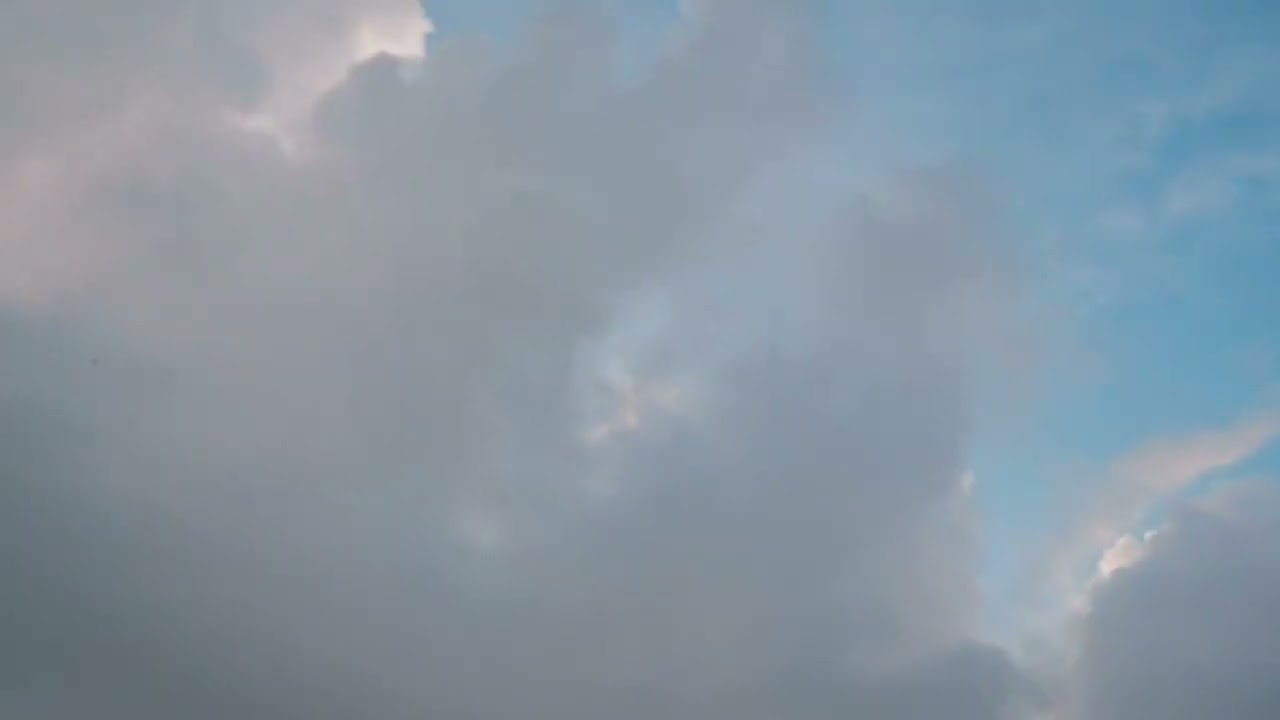 Passing of nimbocumulus clouds - YouTube