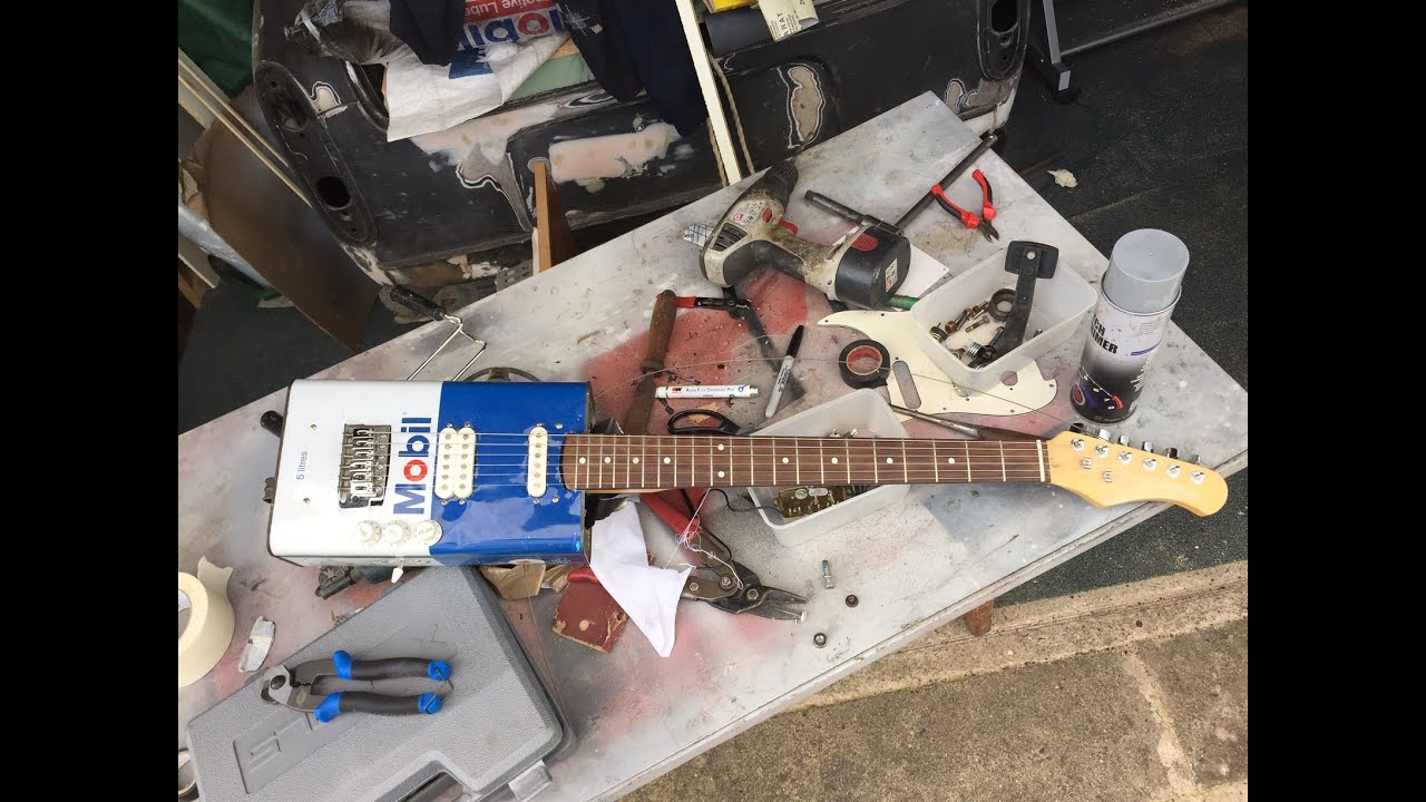 How to make an OIL CAN GUITAR the easy way! - YouTube