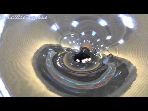 Watch Multiple Coins in a Spiral Vortex Funnel - YouTube