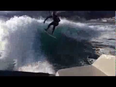 big wake behind a boat for wake surfing - YouTube