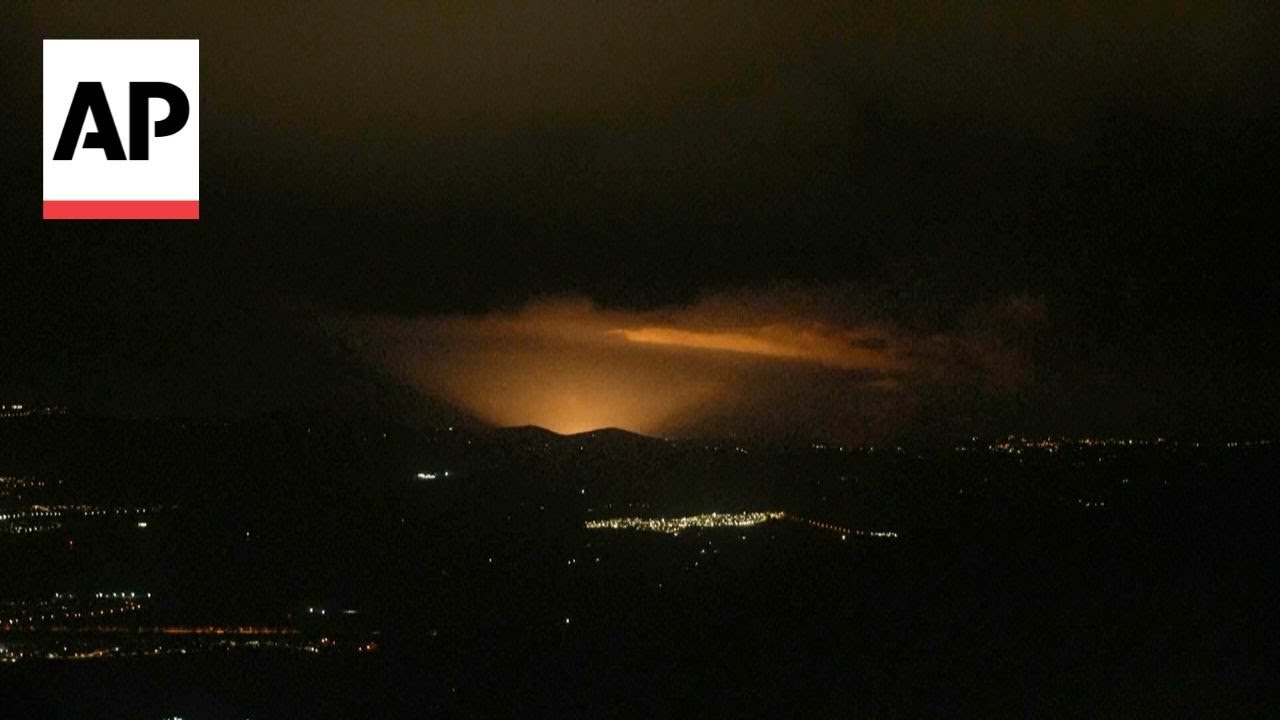 Explosions light up night sky in southern Lebanon - YouTube