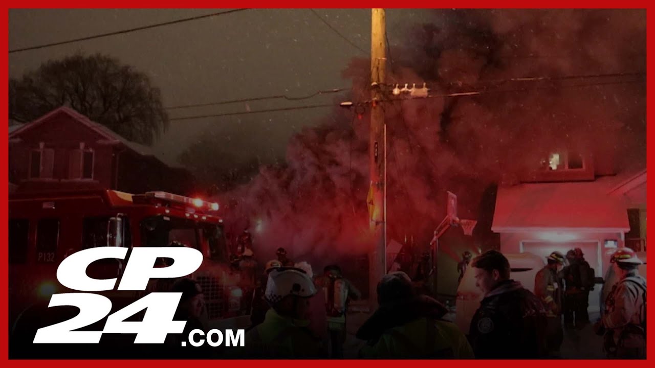 Fire crews tackle a house fire in North York - YouTube