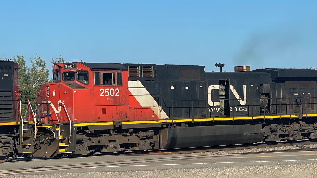 3 CN locomotives with a C44-9WL on the BNSF H-GALMIN at Becker, MN ...