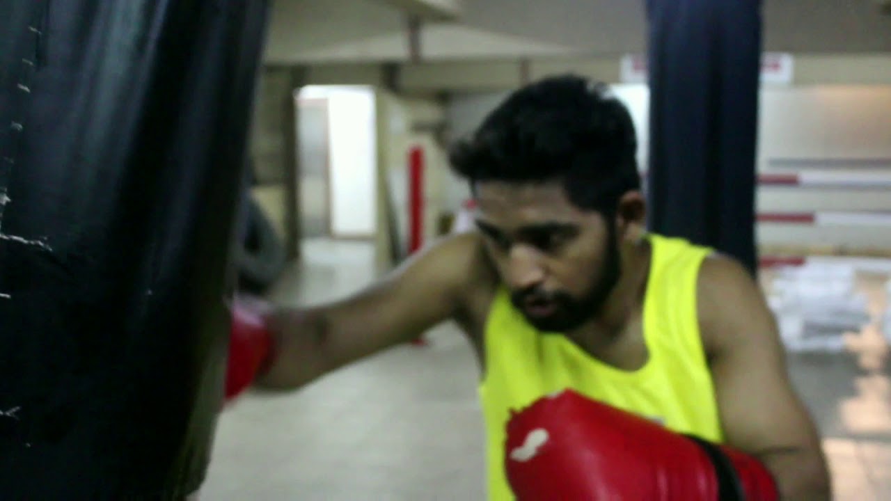 Jab right and both hand uppercut on boxing bag - YouTube