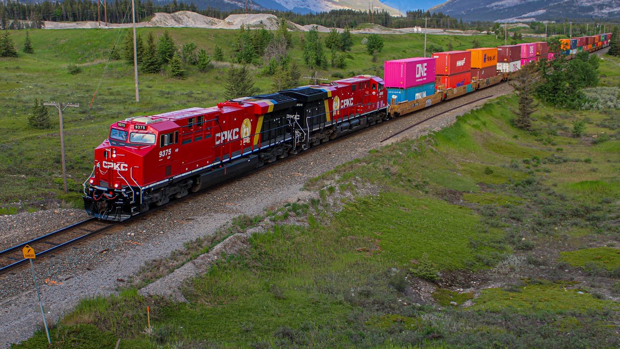 THE FIRST "CPKC" UNITS!!!! CP 9375 and KCS 4805 lead CPKC 100 at Seebe, Alberta - YouTube