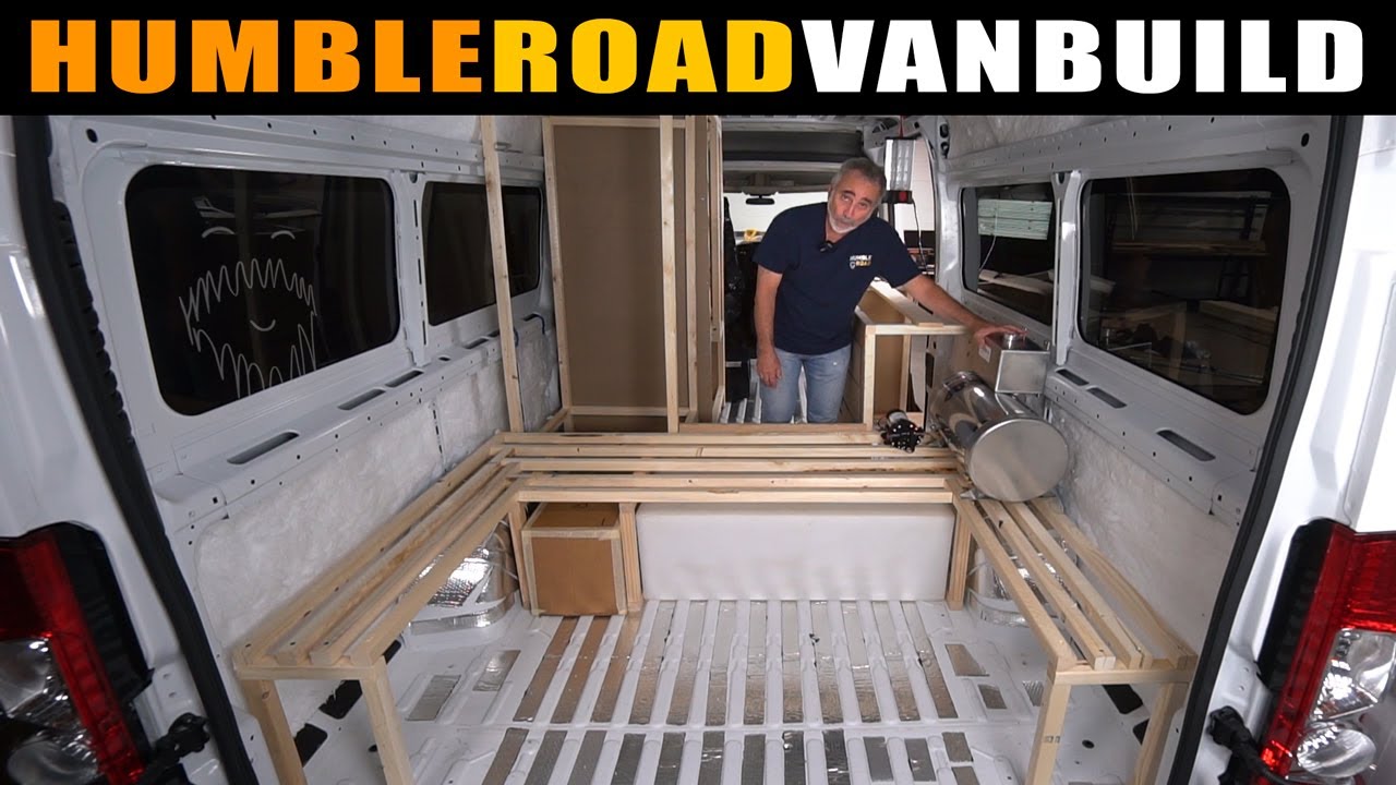 Massive storage & hidden shower found in this cardboard van build - YouTube