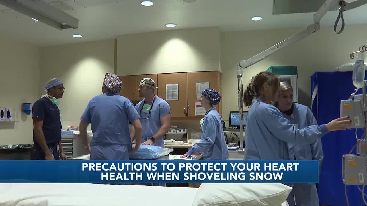 Avoiding heart attacks while shoveling snow - YouTube
