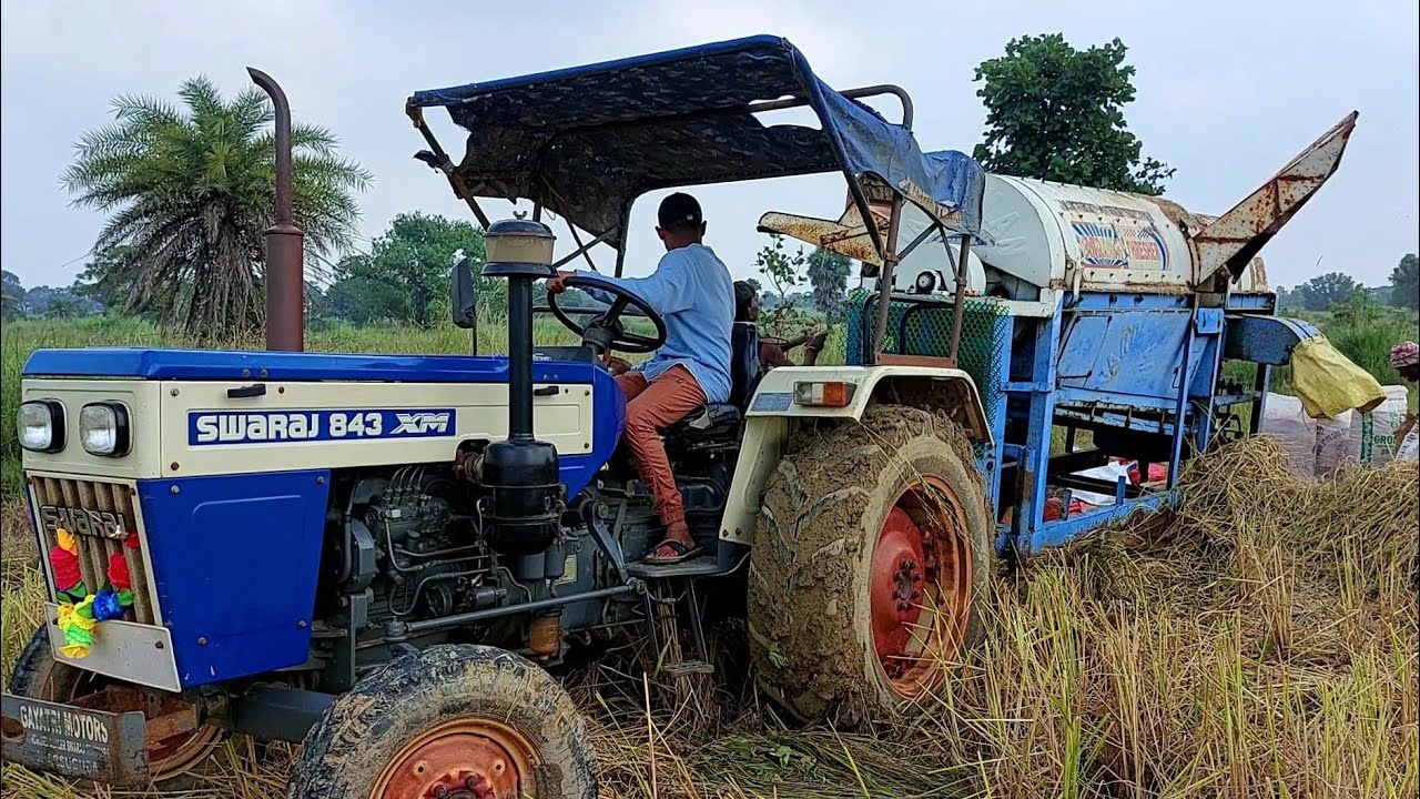 Swaraj 843 Xm Tractor Stuck In Mud With Paddy Thresher Machine ...