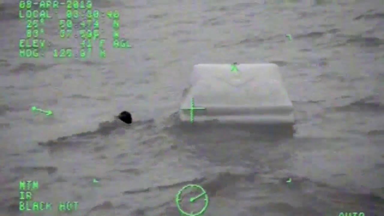 US Coast Guard rescues 3 from life raft after fishing boat sinks - YouTube