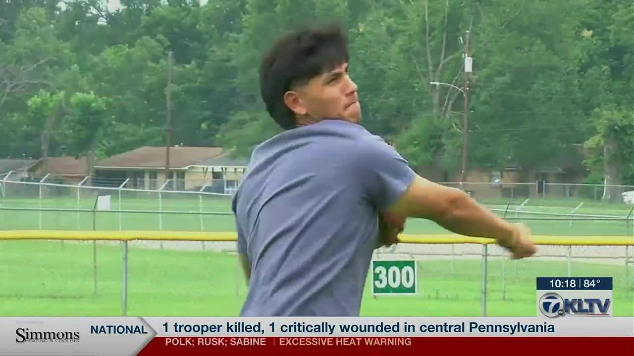Tyler ISD graduate throws first pitch at Texas Rangers game - YouTube