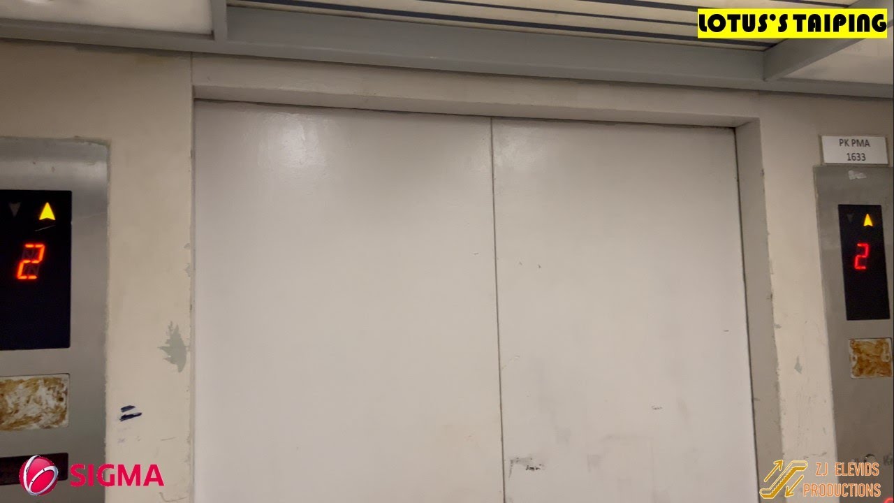 2 Sigma Elevators at Lotus's Taiping, Perak, Malaysia. (Service Lift ...