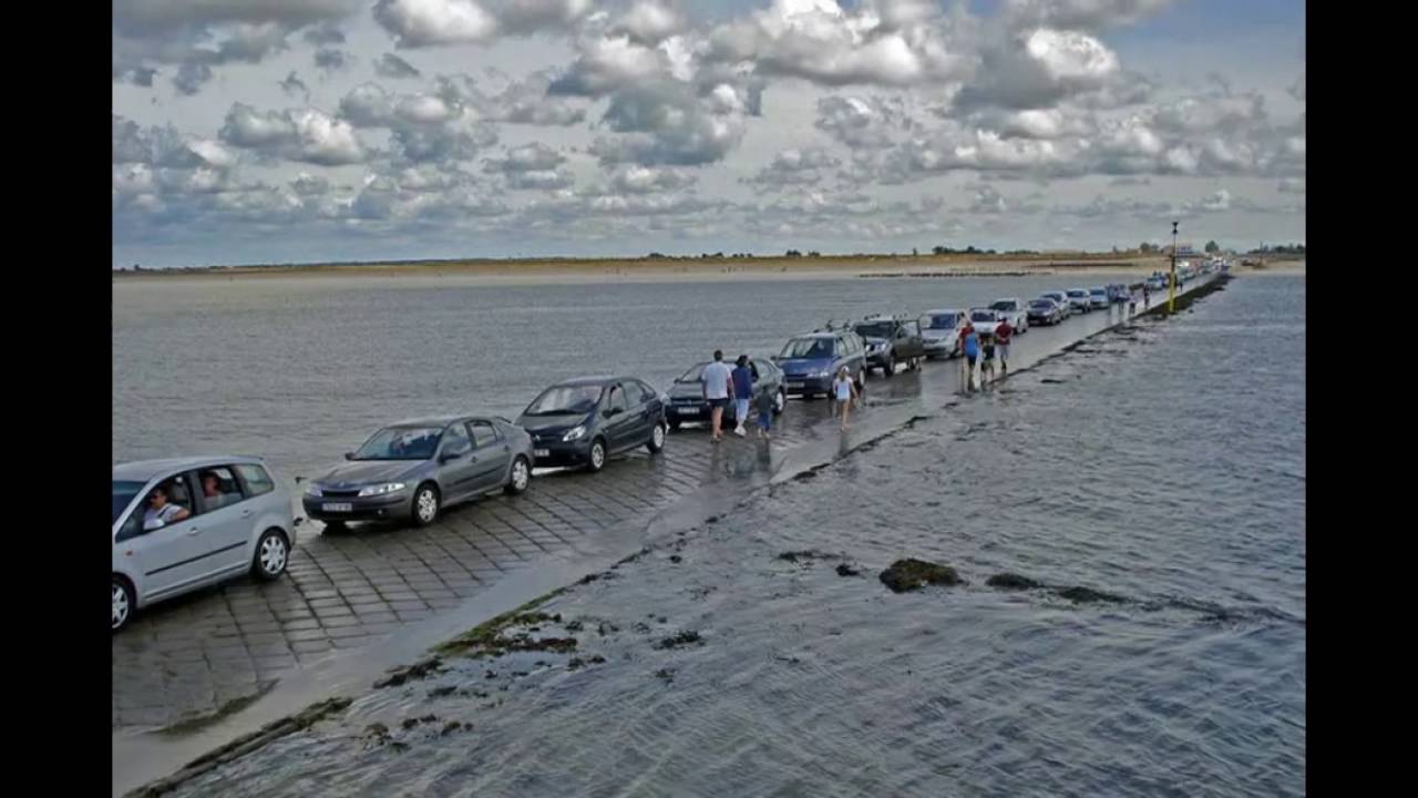 This Road In France Disappears Underwater Twice A Day - YouTube