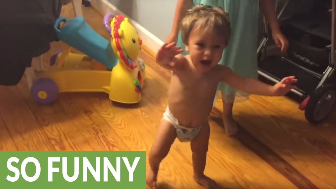 Baby screams with excitement while taking very first steps - YouTube