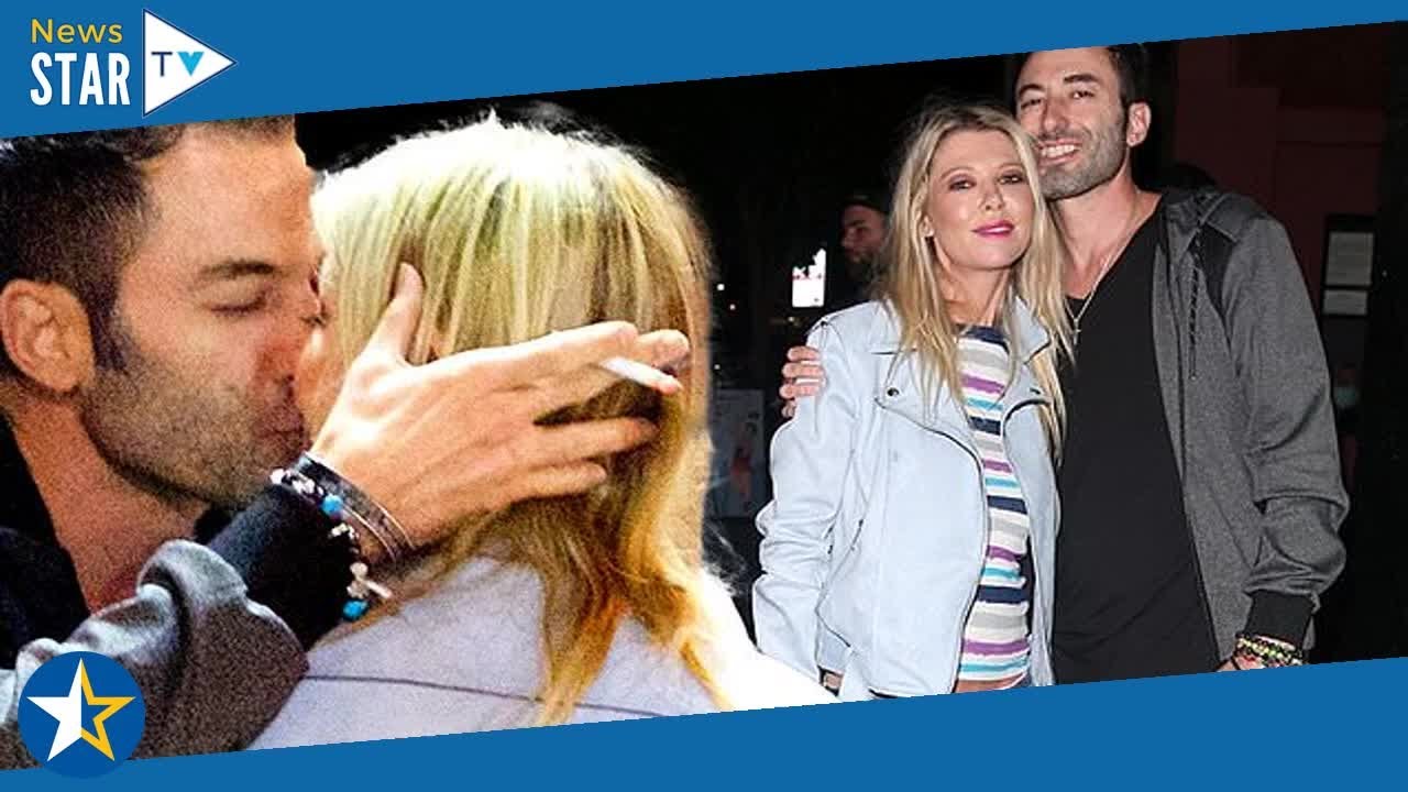 Tara Reid and her boyfriend Nathan Montpetit-Howar share a kiss during ...