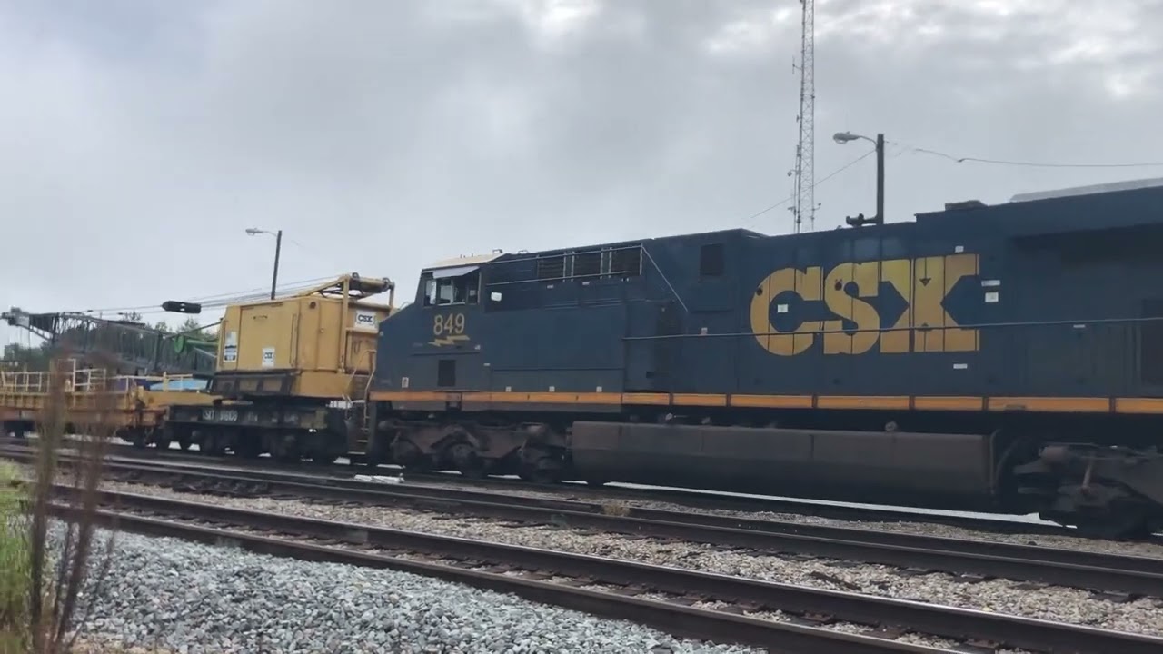 CSX 3207 pulls some type of crane out of the Maxwell Yard siding on 8 ...