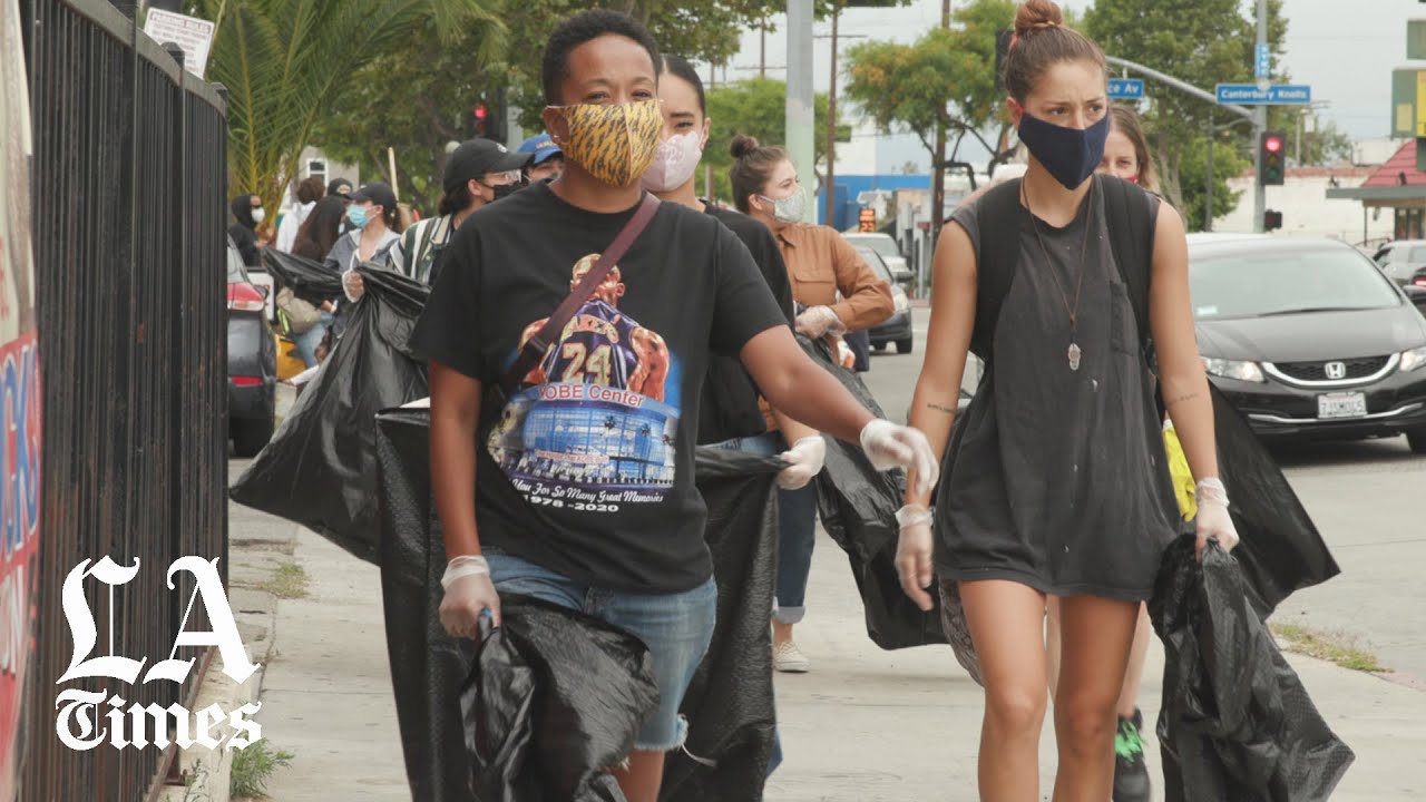 In South L.A., protesters hit the streets with brooms and trash bags ...