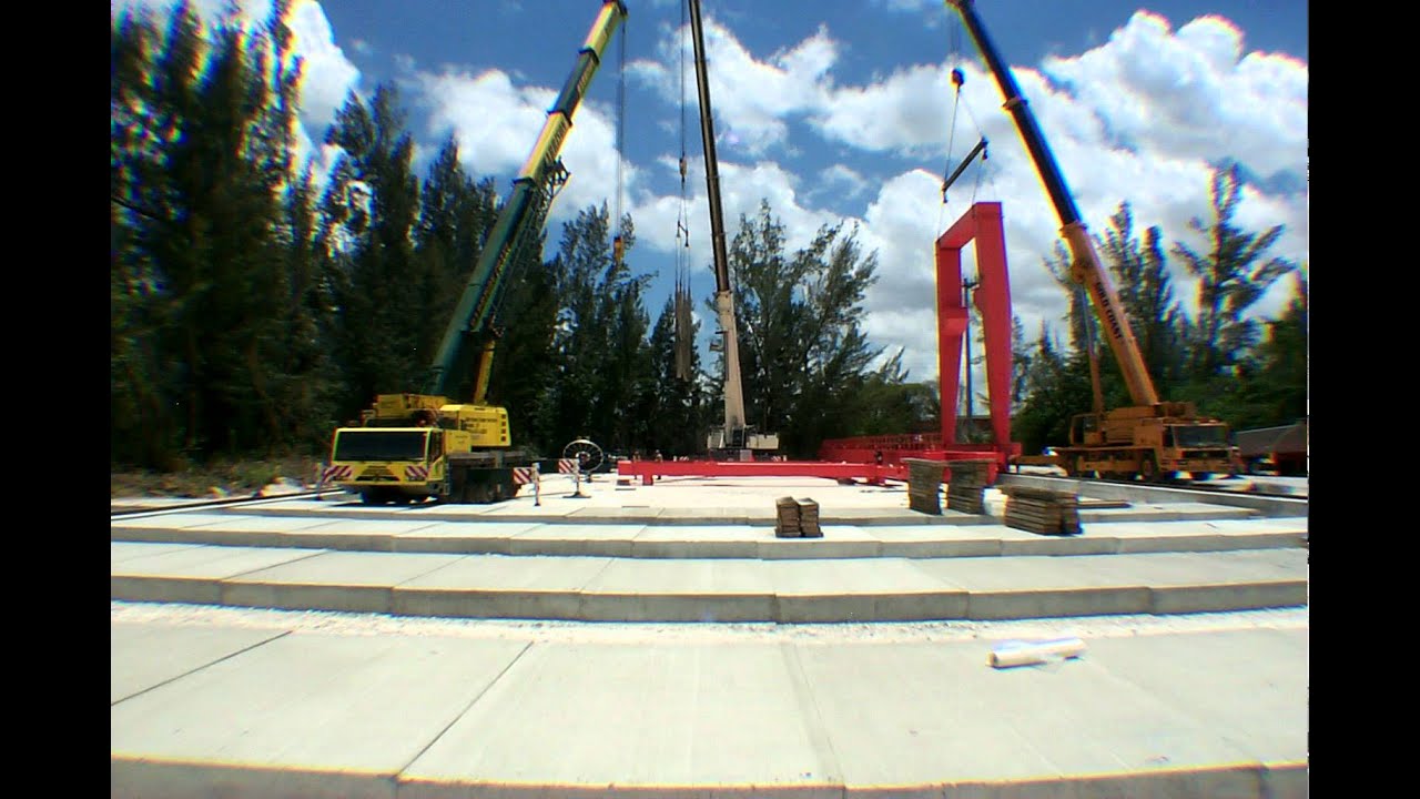 Harrison Crane time lapse of 3 cranes erecting large straddle crane ...