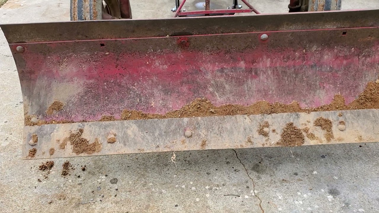Mounting a push blade on a Farmall tractor. - YouTube