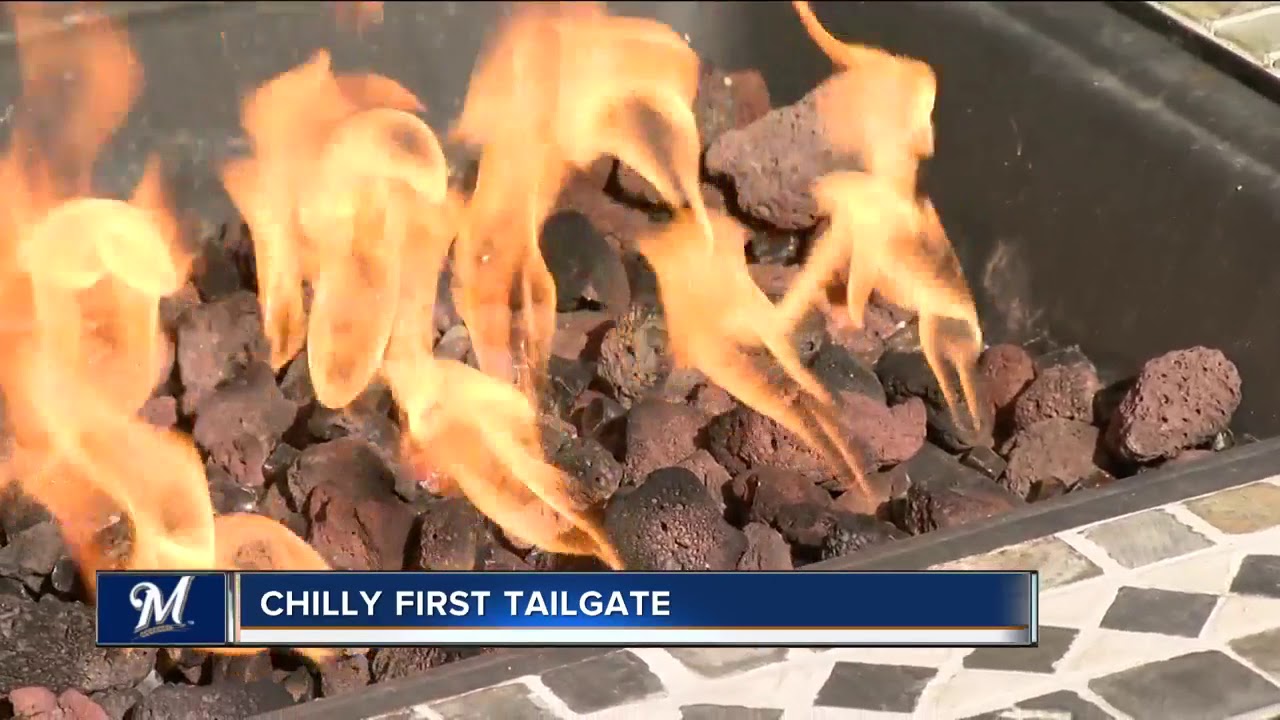 Fans battle cold weather for Opening Day tailgate at Miller Park - YouTube