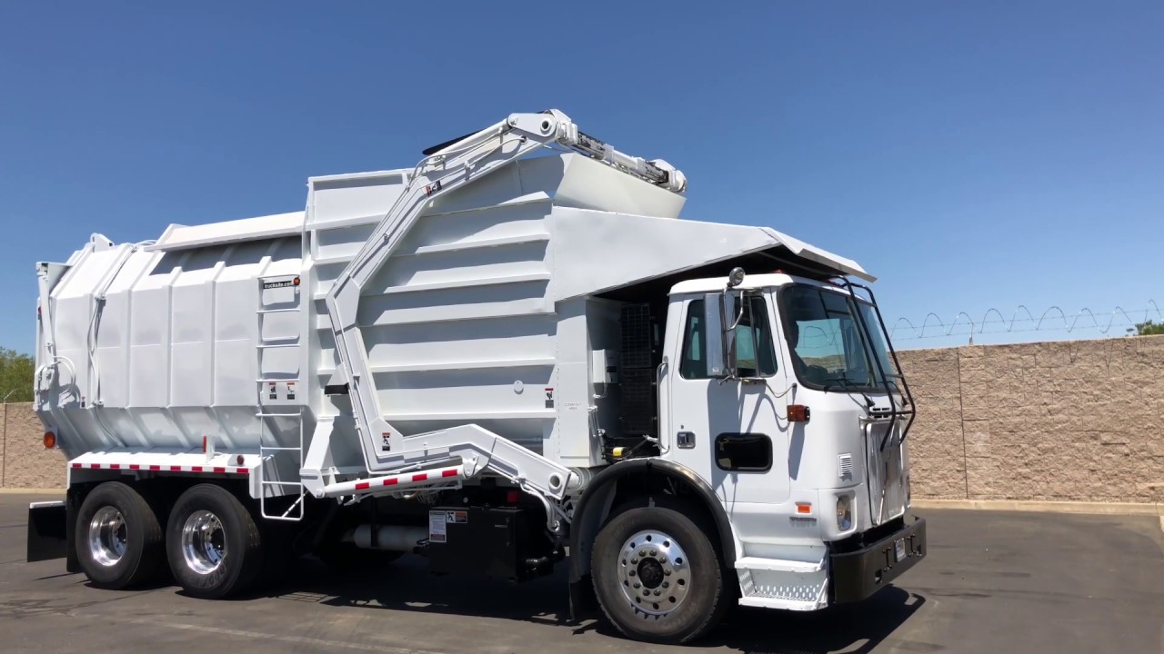 1999 Volvo WX64 Amrep 38 Yard Front Loader - YouTube